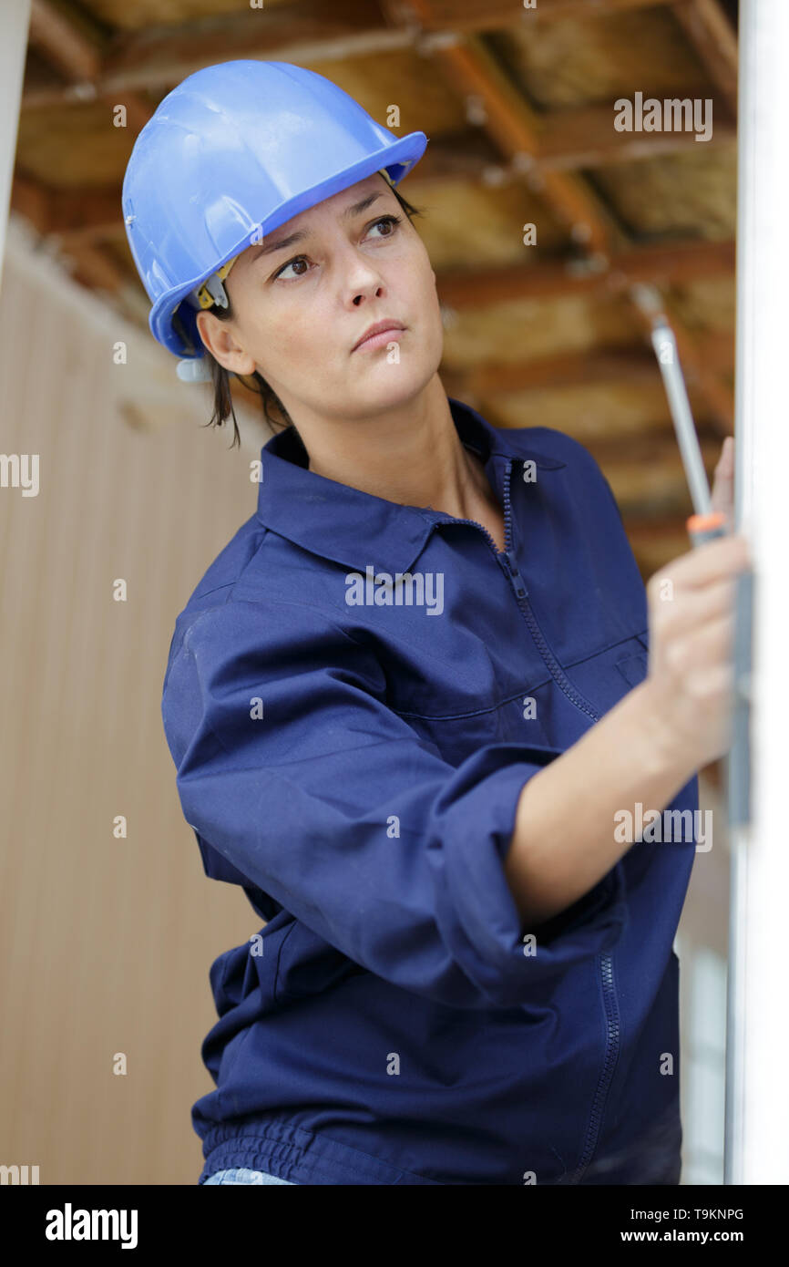 woman fixing the plug point Stock Photo - Alamy