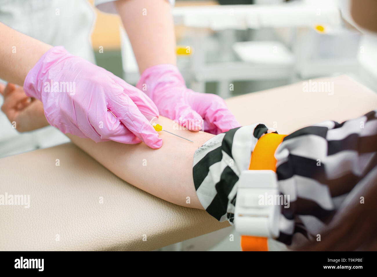 Takes blood for analysis. Blood sampling in the manipulation room Stock ...