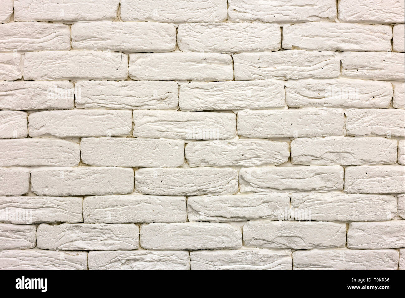 Close-up of white painted whitewashed solid brick wall. Abstract copy ...