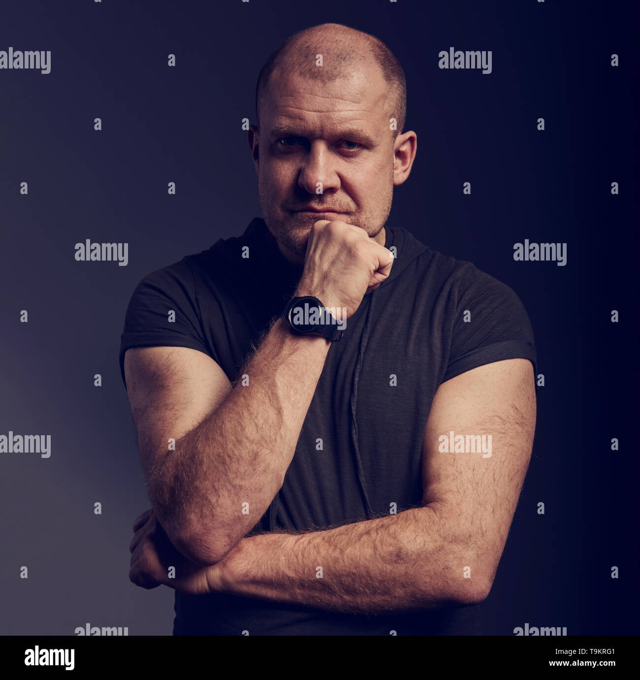 Sad angry crime man with bald head thinking with doubt look in ...