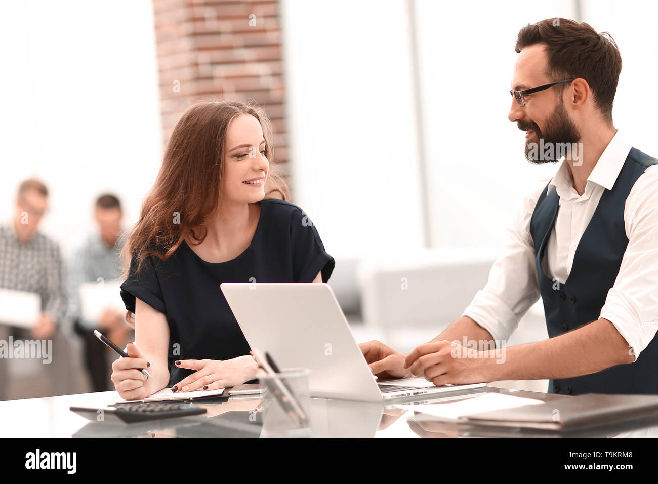 business colleagues sitting at a Desk in the office. business concept ...