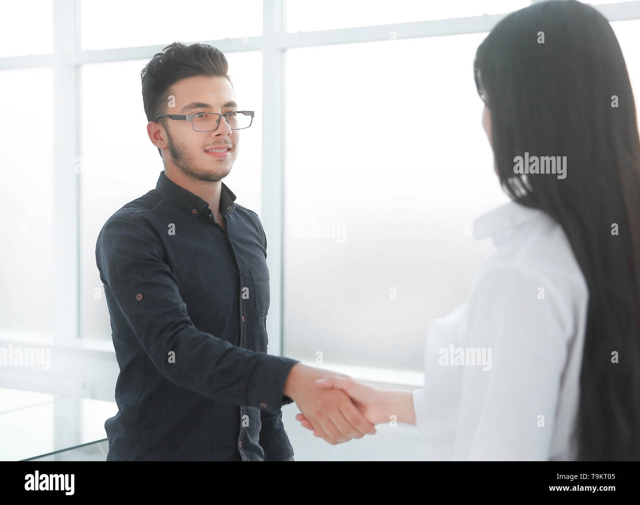 welcome handshake of business people in the office.concept of ...
