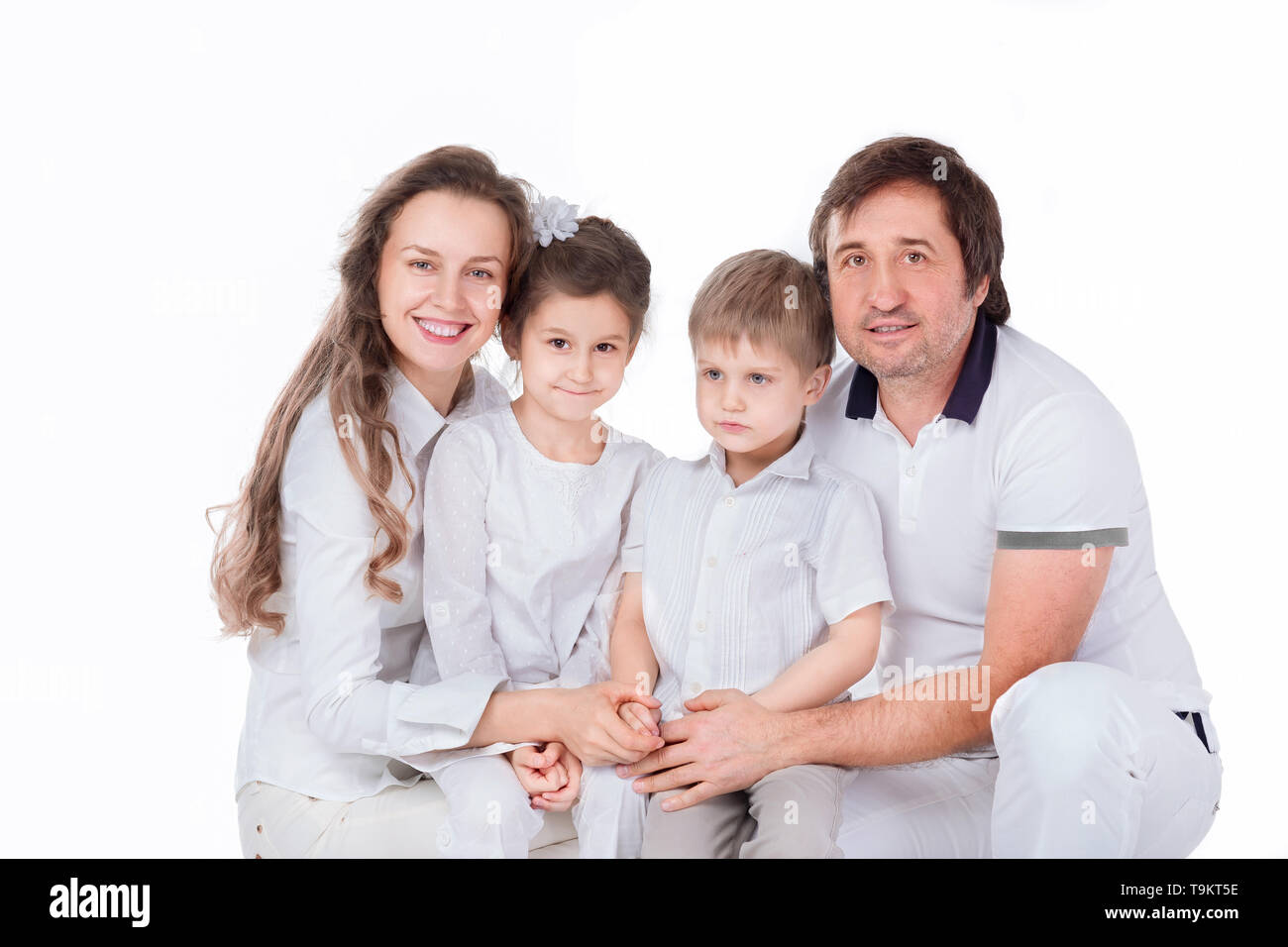 close up. happy family with two children .isolated on white background ...