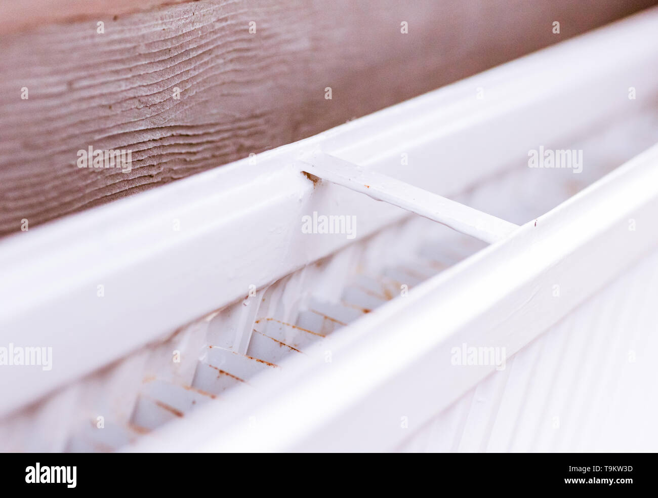 Radiator - large white radiator on a brick wall Stock Photo - Alamy