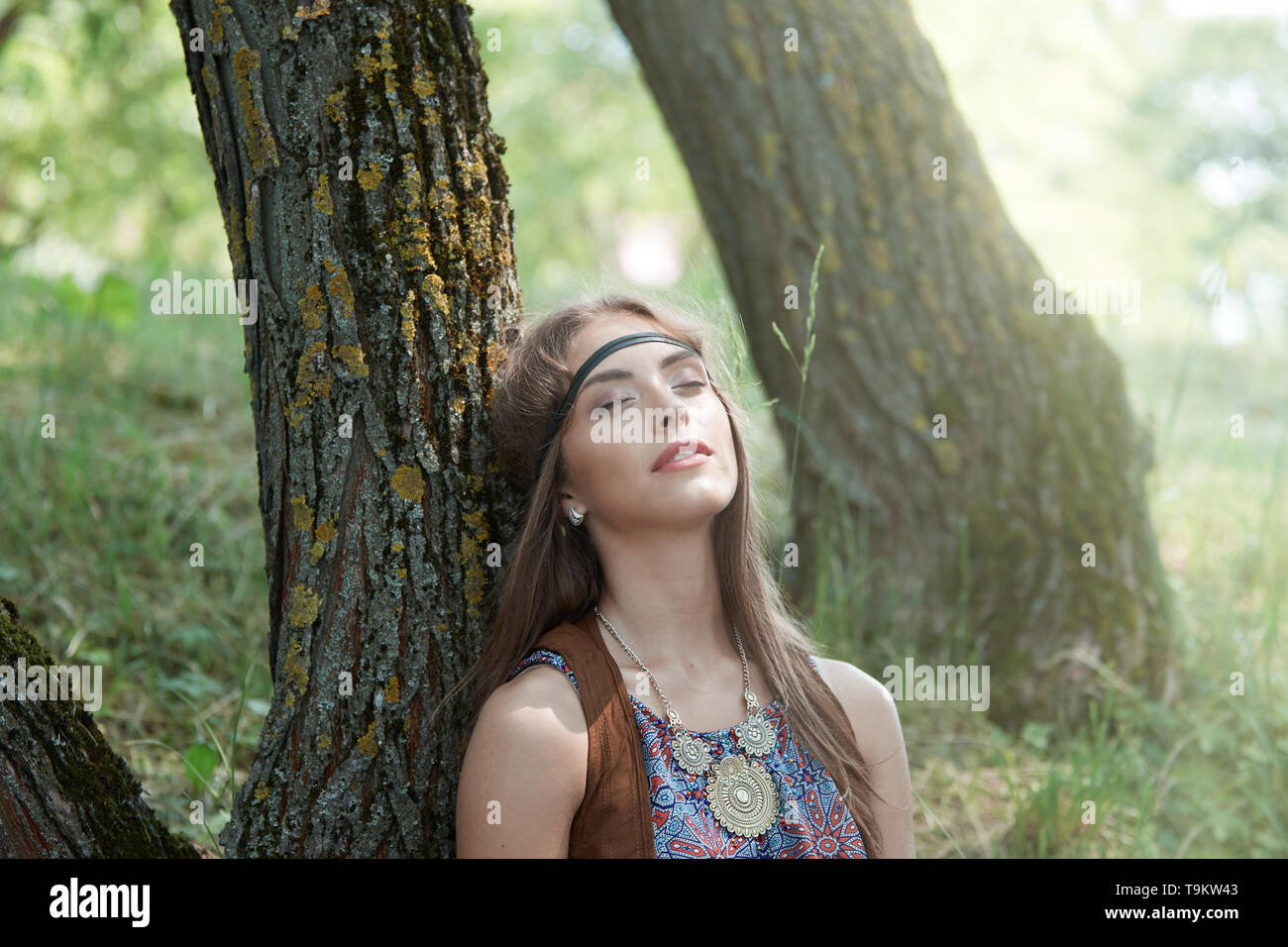 close up. portrait of a dreaming hippie girl . the concept of unity ...