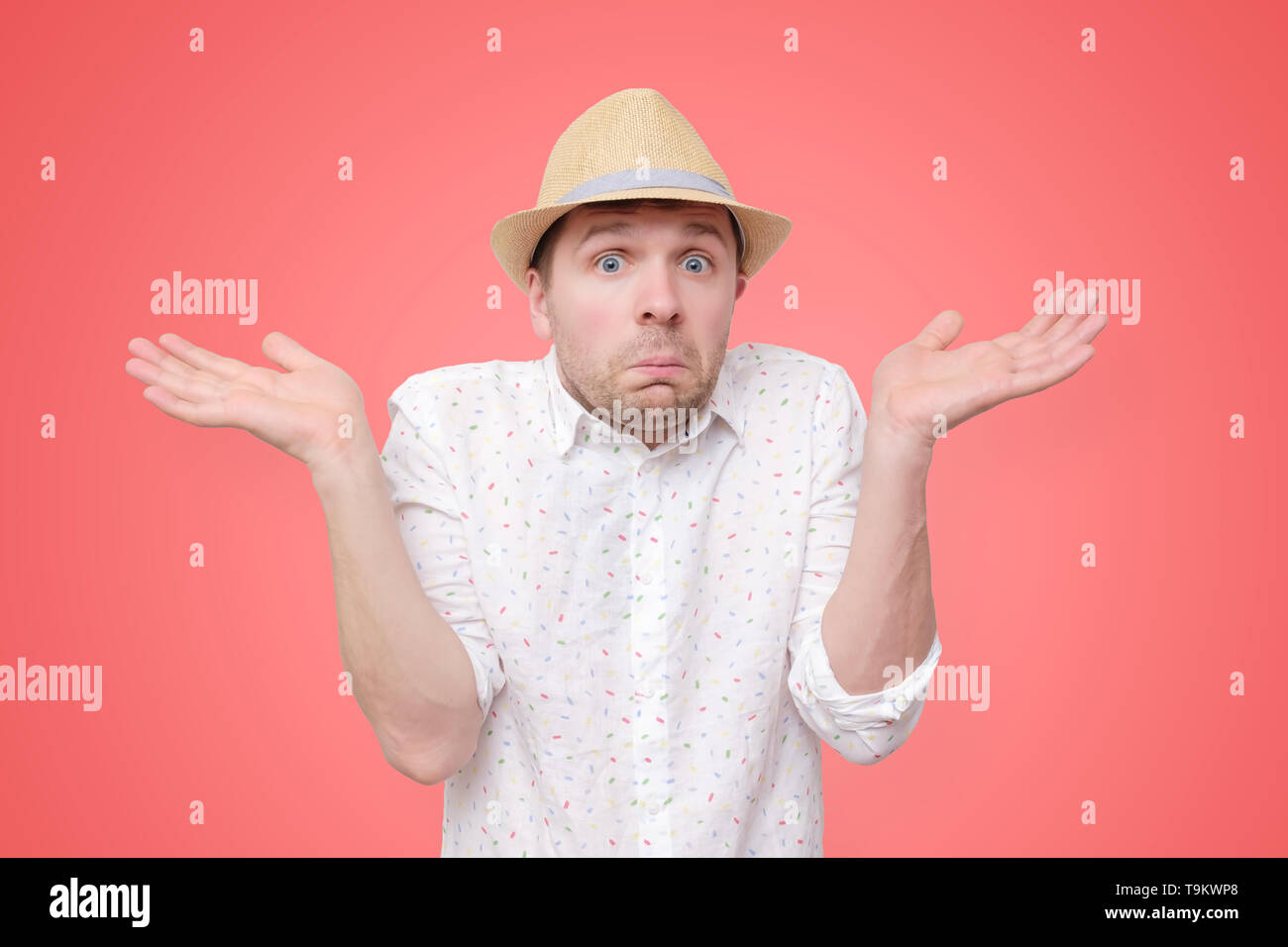 Nervous doubtful tourist man having puzzled look Stock Photo - Alamy