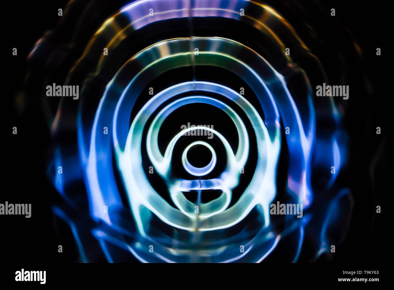 Sound waves in the dark in full color Stock Photo - Alamy
