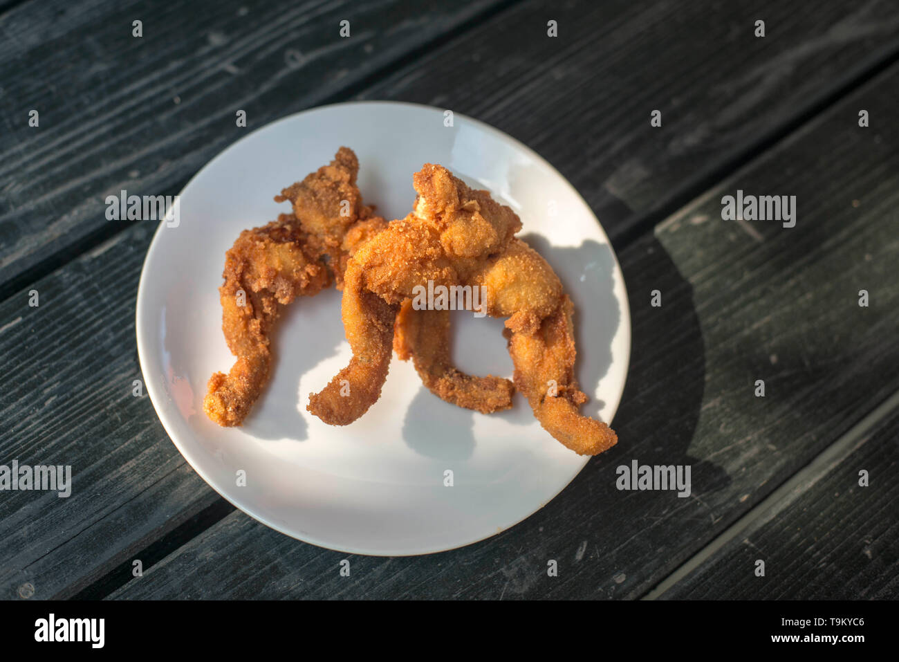 fried frog legs Stock Photo - Alamy