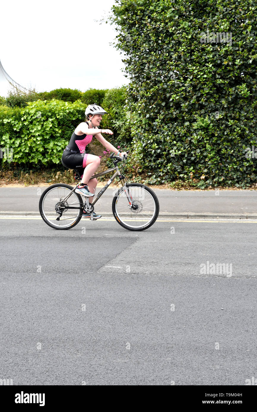 Female triathlon competitor on cycle hi-res stock photography and ...