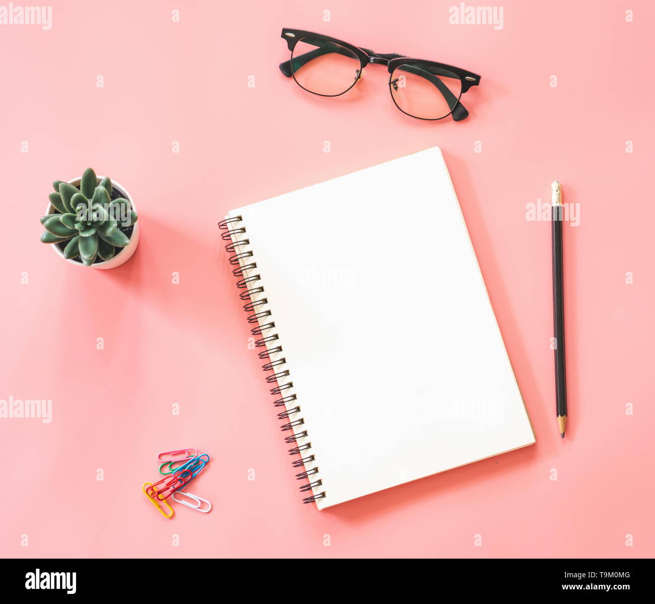 Flat lay mockup design of workspace desk with blank notebook ...