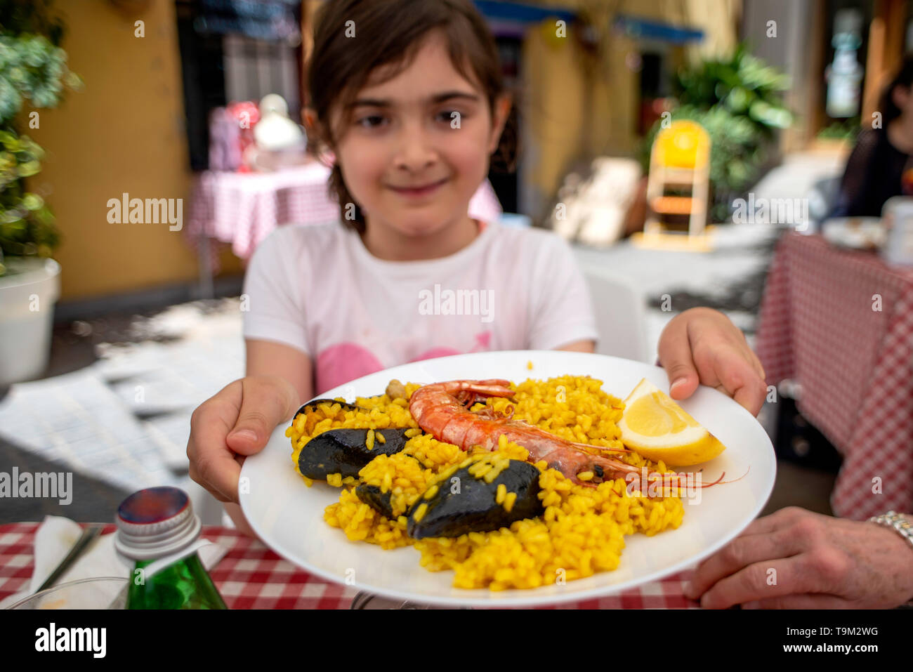 Eating children paella hi-res stock photography and images - Alamy