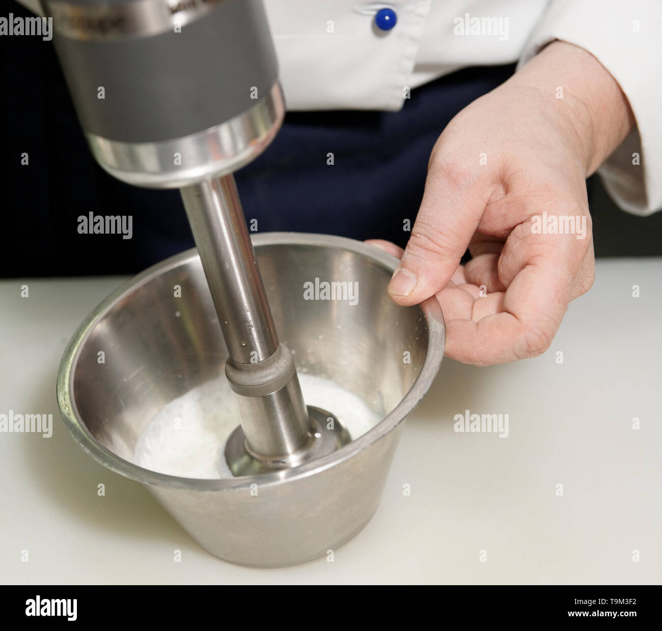 Mixing sauce hand mixer hi-res stock photography and images - Alamy