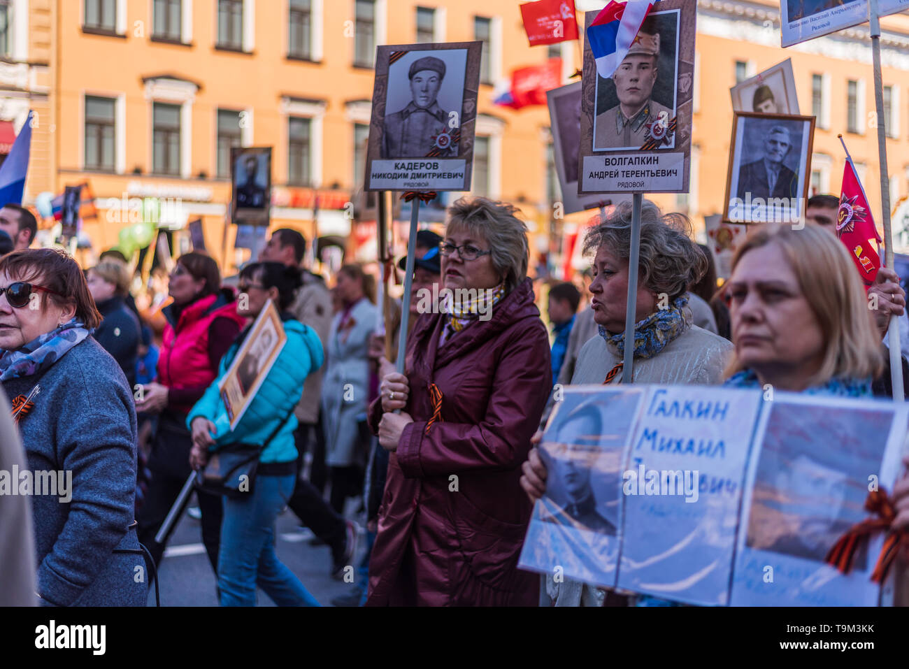 People carry world flags hi-res stock photography and images - Alamy