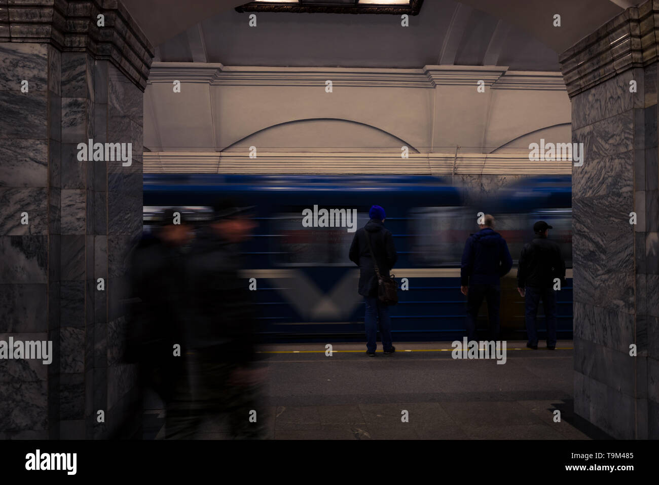 Passenger waiting for the subway at Kirovsky Zavod metro station ...