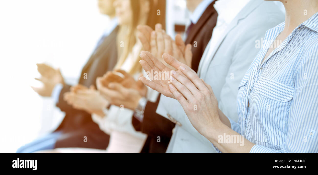 Business people clapping and applause at meeting or conference, close ...