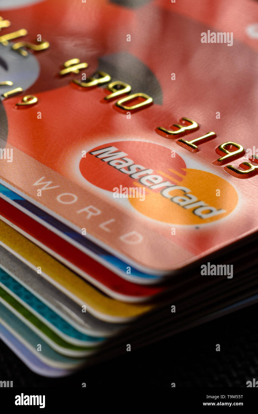 Lviv, Ukraine - 26 April 2019 : Close-up of mastercard credit cards ...