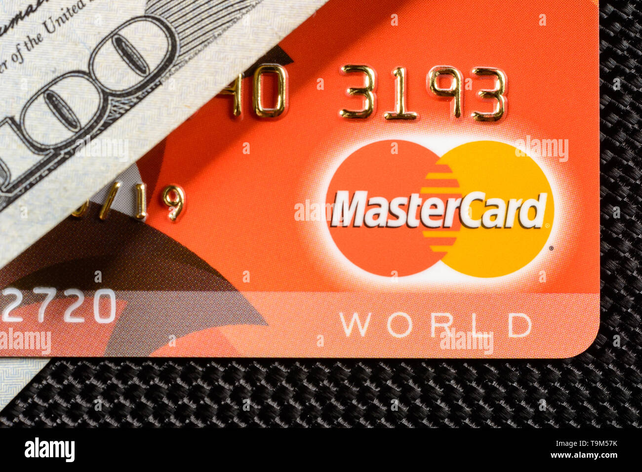 Lviv, Ukraine - 26 April 2019 : A red card with a MasterCard logo is ...