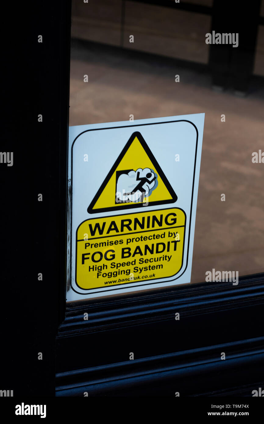 Fog Bandit warning sign displayed on jewellers door, high speed ...