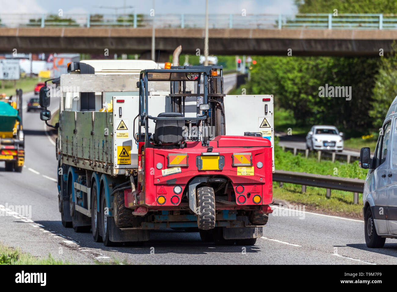 moffet lorry truck with forklift on uk motorway in fast motion Stock ...