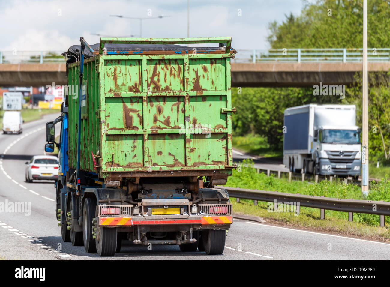 waste tipper lorry truck on uk motorway in fast motion Stock Photo - Alamy