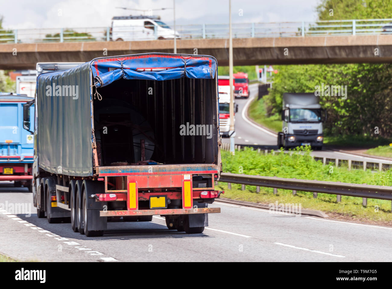 empty open door lorry truck on uk motorway in fast motion Stock Photo ...