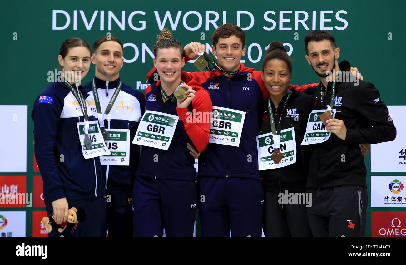 Great Britain's Tom Daley and Grace Reid pose with their gold medals ...