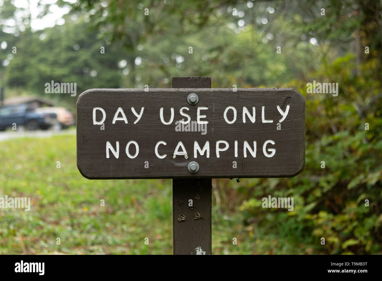 Day Use Only No Camping Sign at park rest area Stock Photo - Alamy
