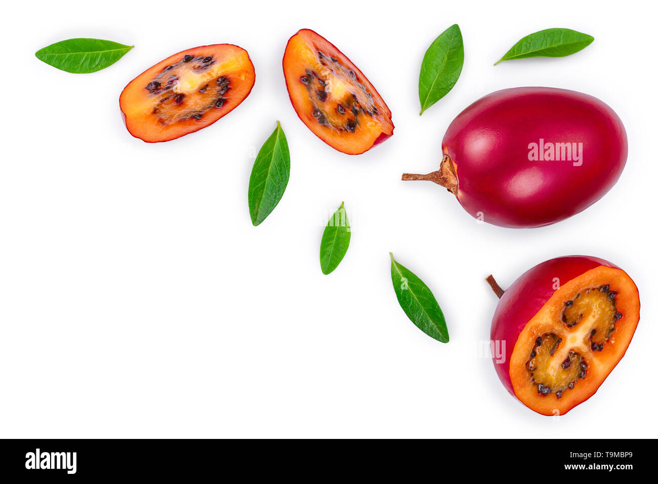 Fresh tamarillo fruit with leaves isolated on white background with ...