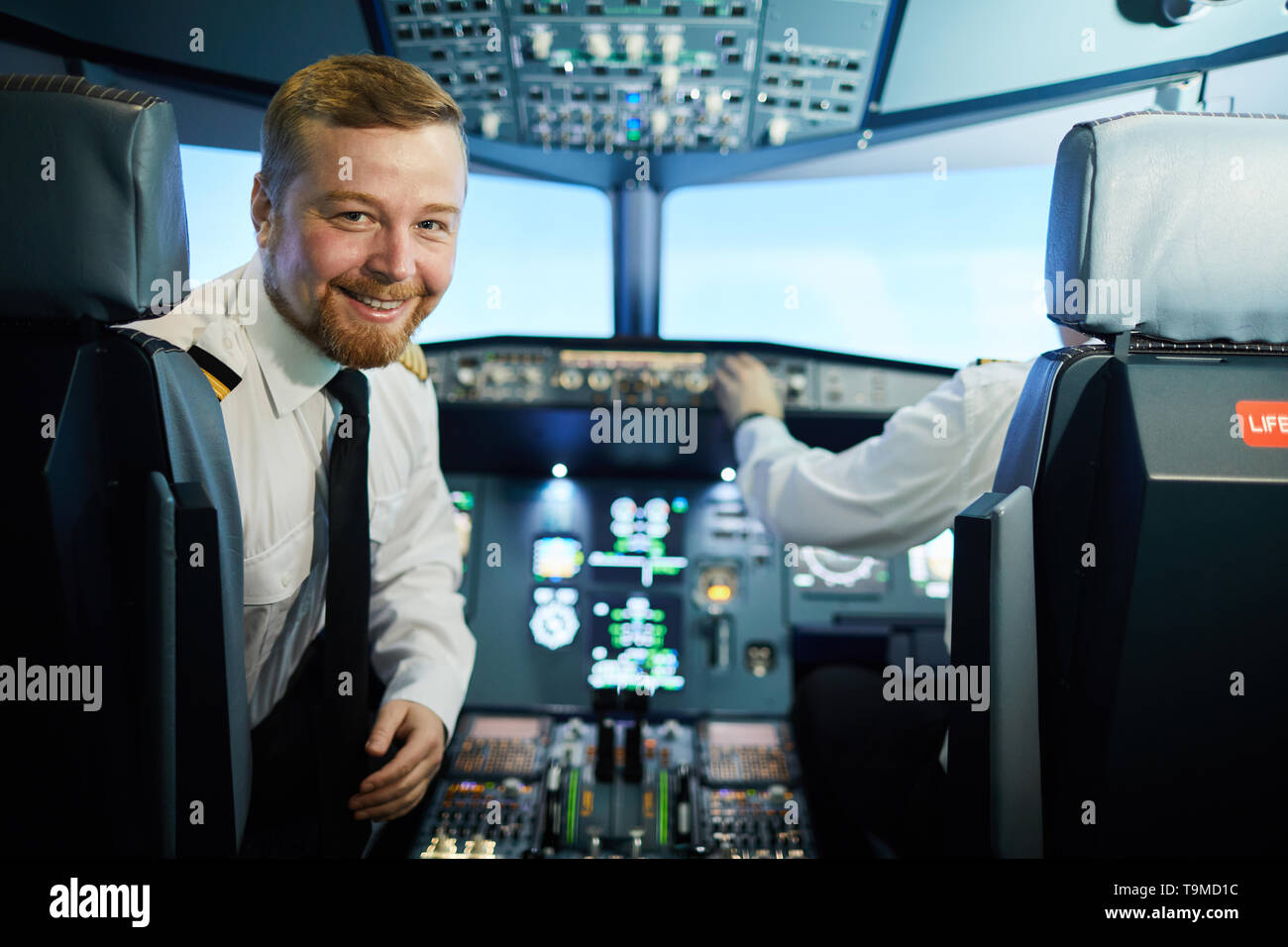 Pilot in cockpit hi-res stock photography and images - Alamy