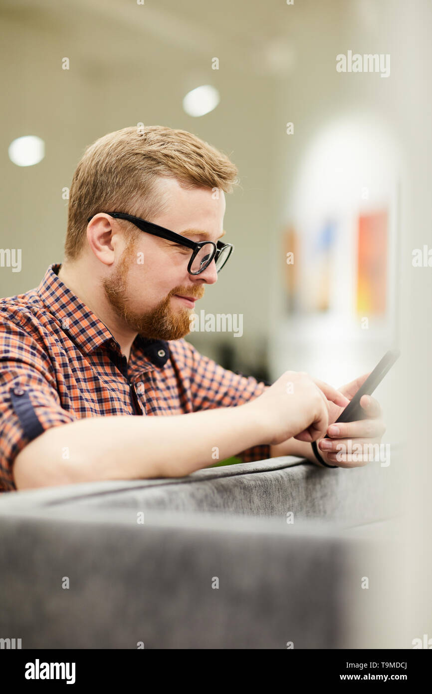 Bearded man reading hi-res stock photography and images - Alamy