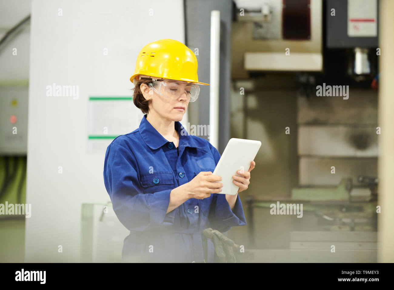 Female Factory Supervisor Stock Photo - Alamy