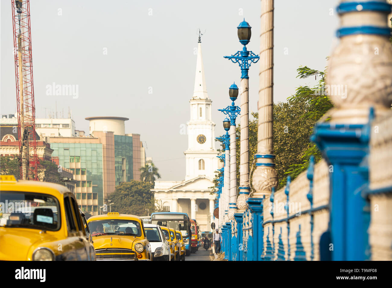 Street traffic with taxi and cars on the streets of Kolkata, India ...