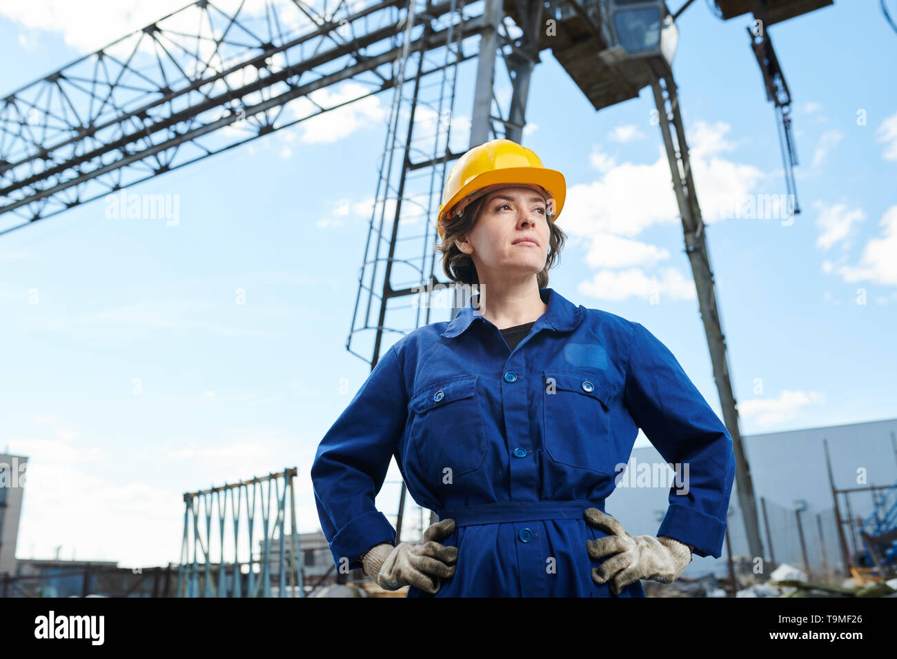 Woman at Construction Site Stock Photo - Alamy