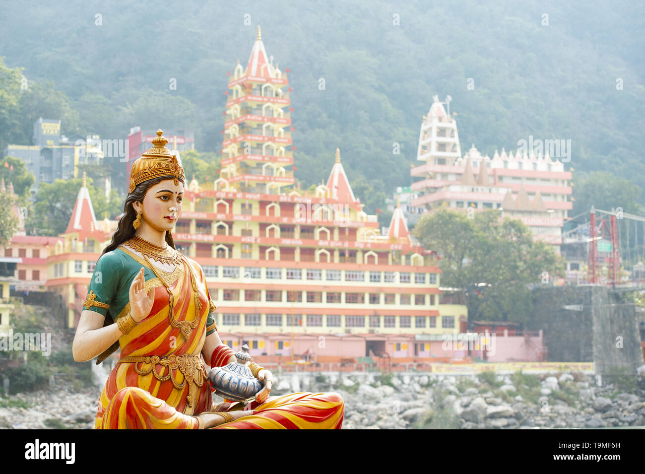 Stunning view of the statue of sitting Goddess Parvati on the riverbank ...