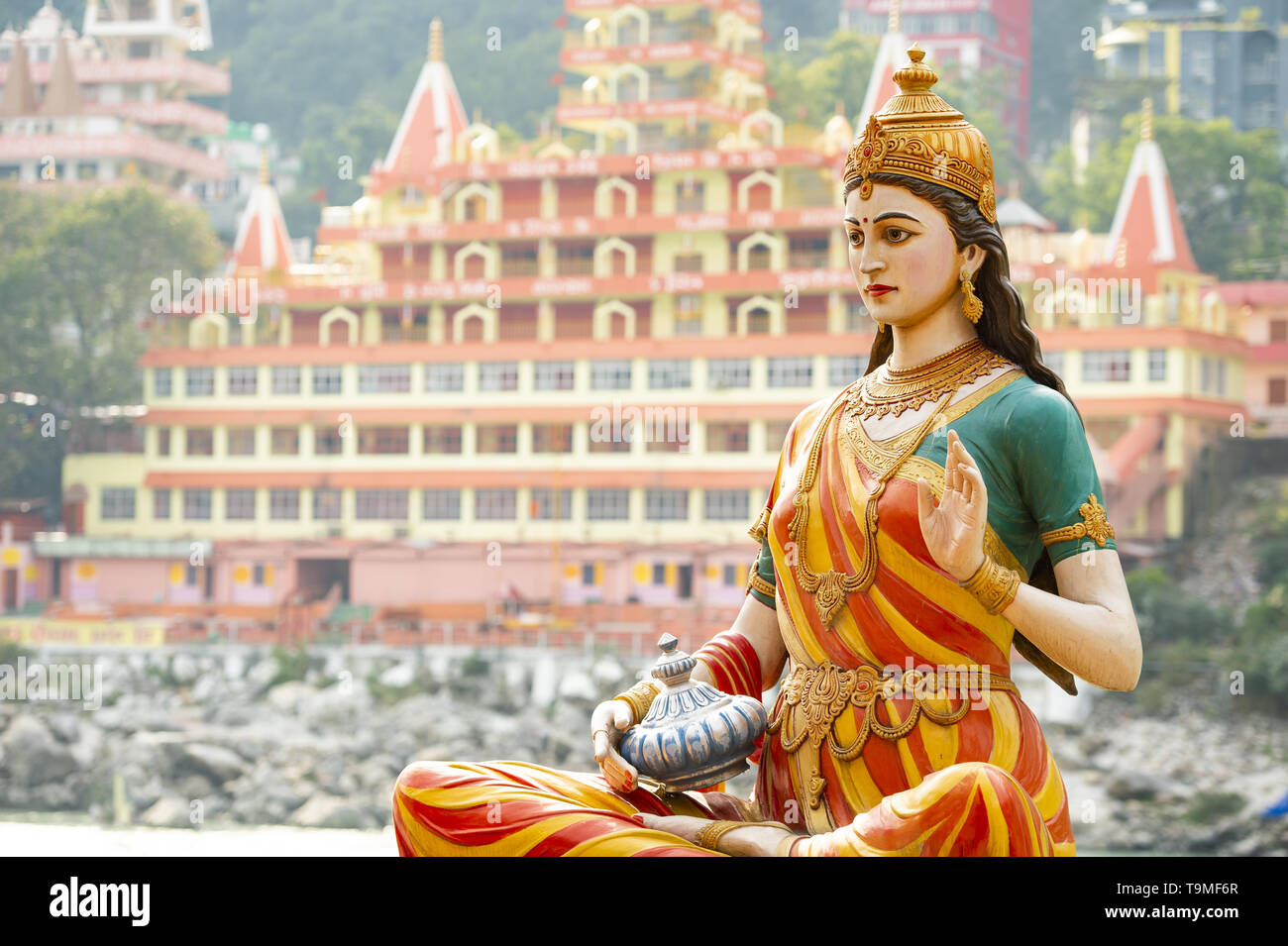 Stunning view of the statue of sitting Goddess Parvati on the riverbank ...