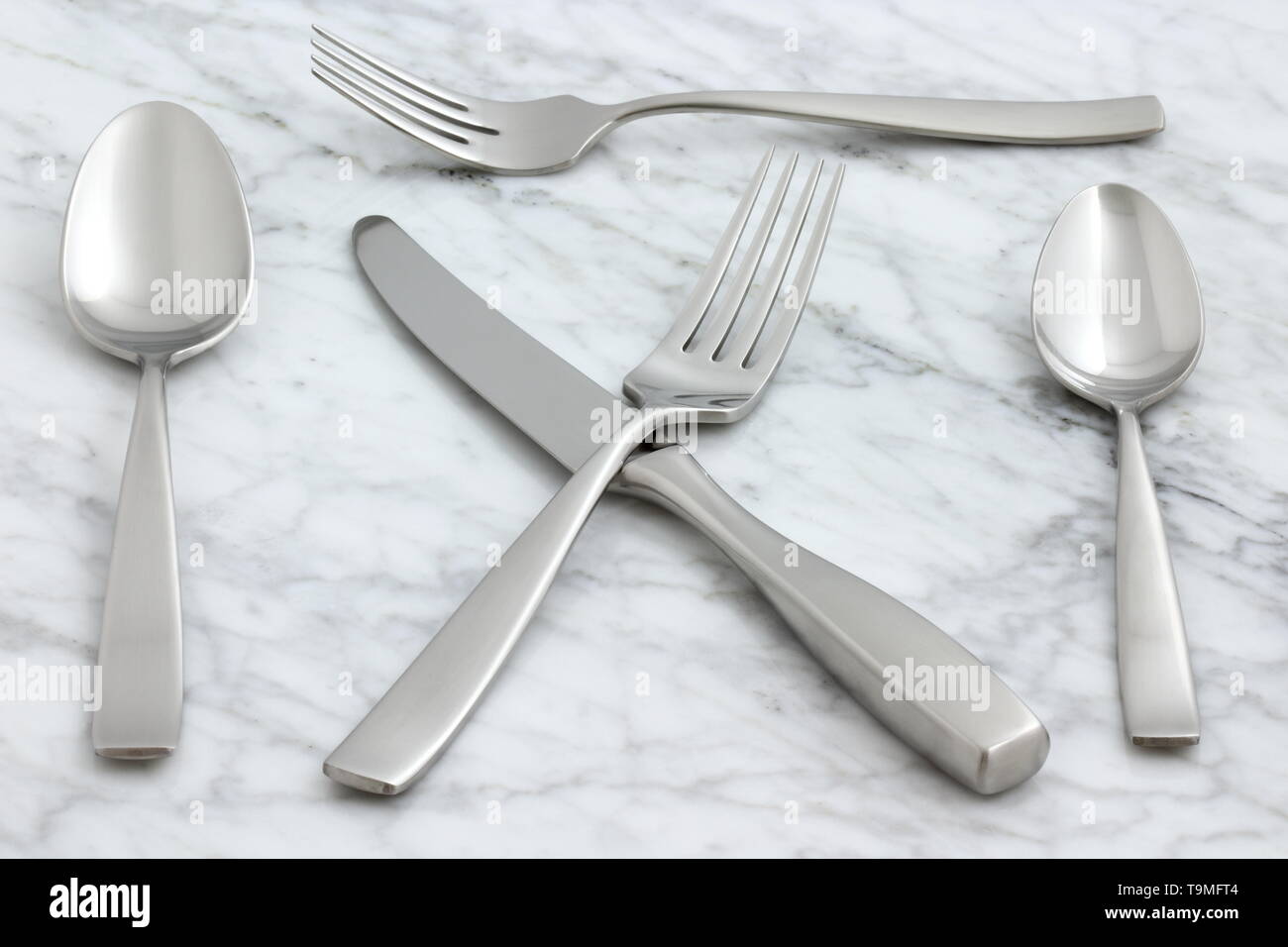 trendy and beautiful silverware set styled antique carrara marble Stock ...