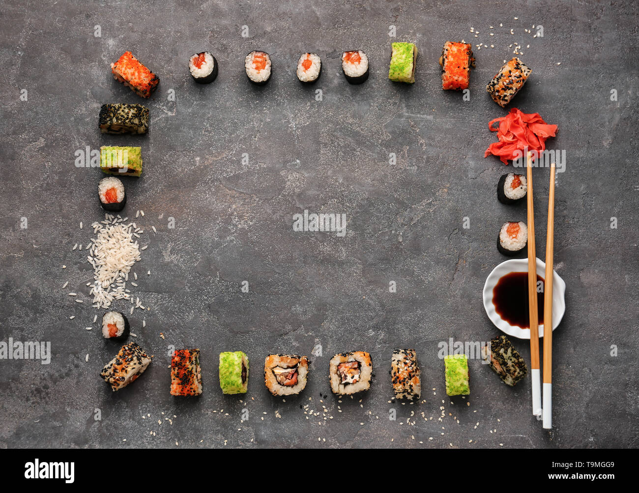 Frame made of different sushi on grey background Stock Photo - Alamy