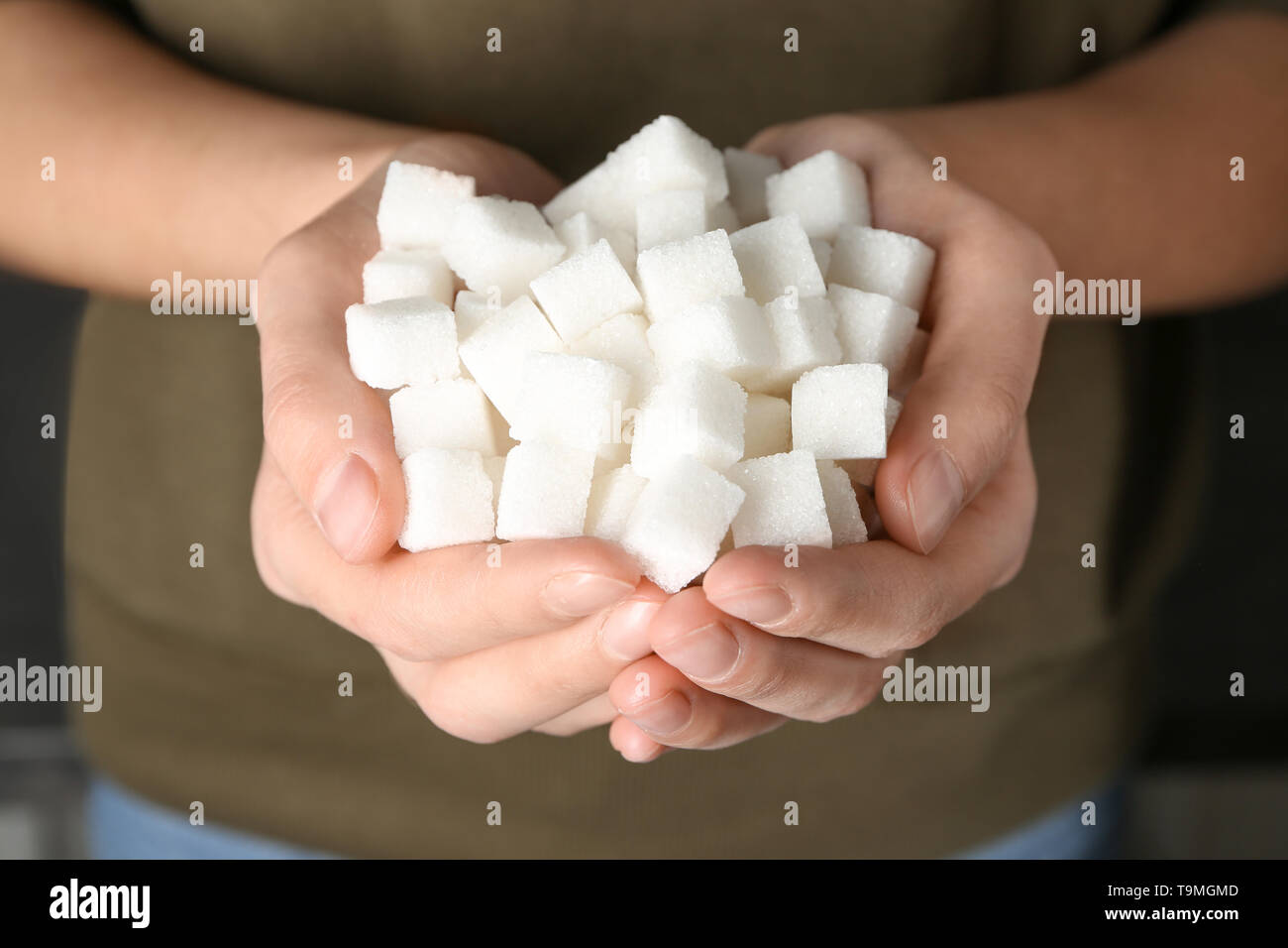 Woman sugar cubes hi-res stock photography and images - Alamy