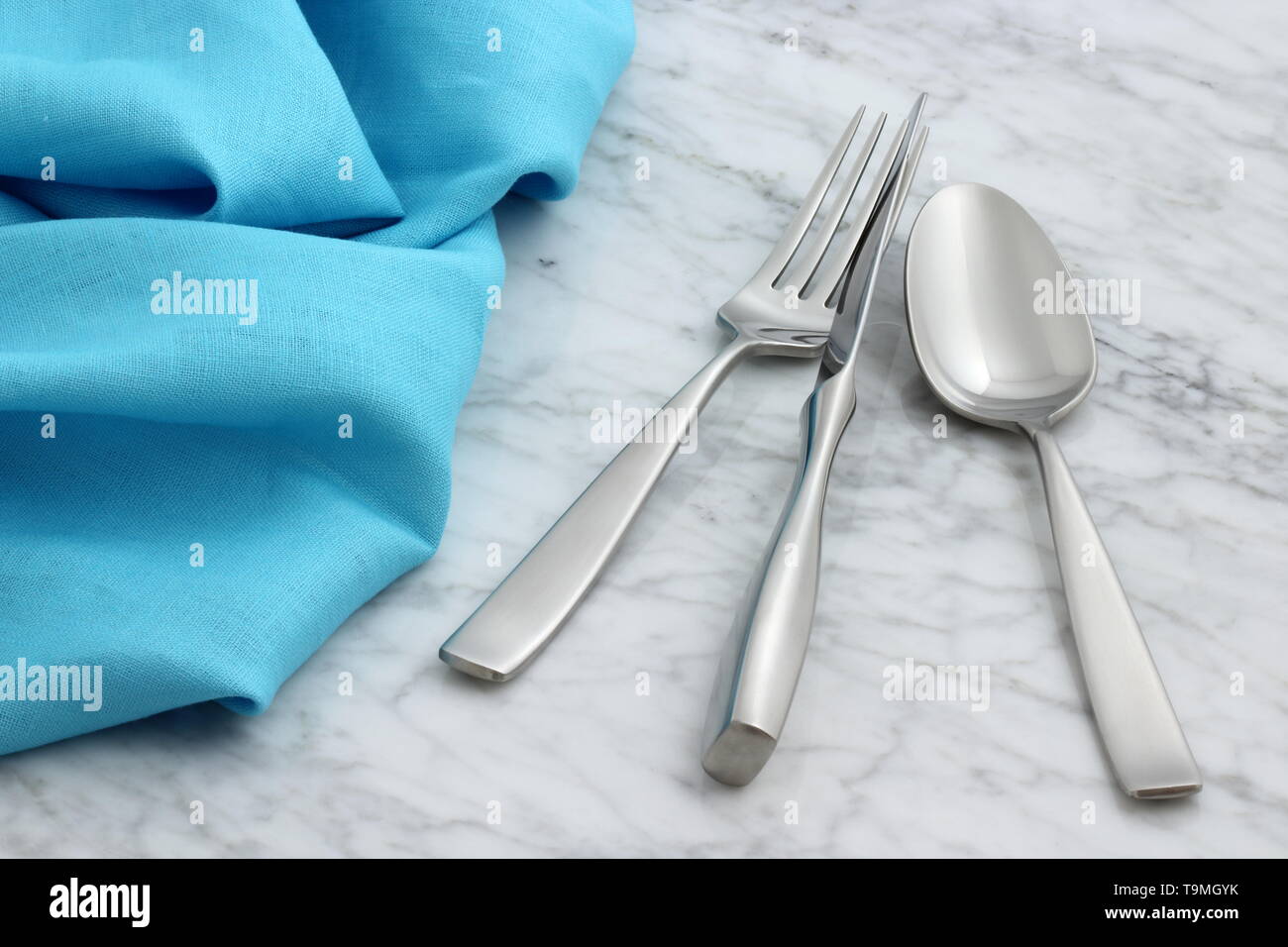 trendy and beautiful silverware set styled on linen double hemstitch ...