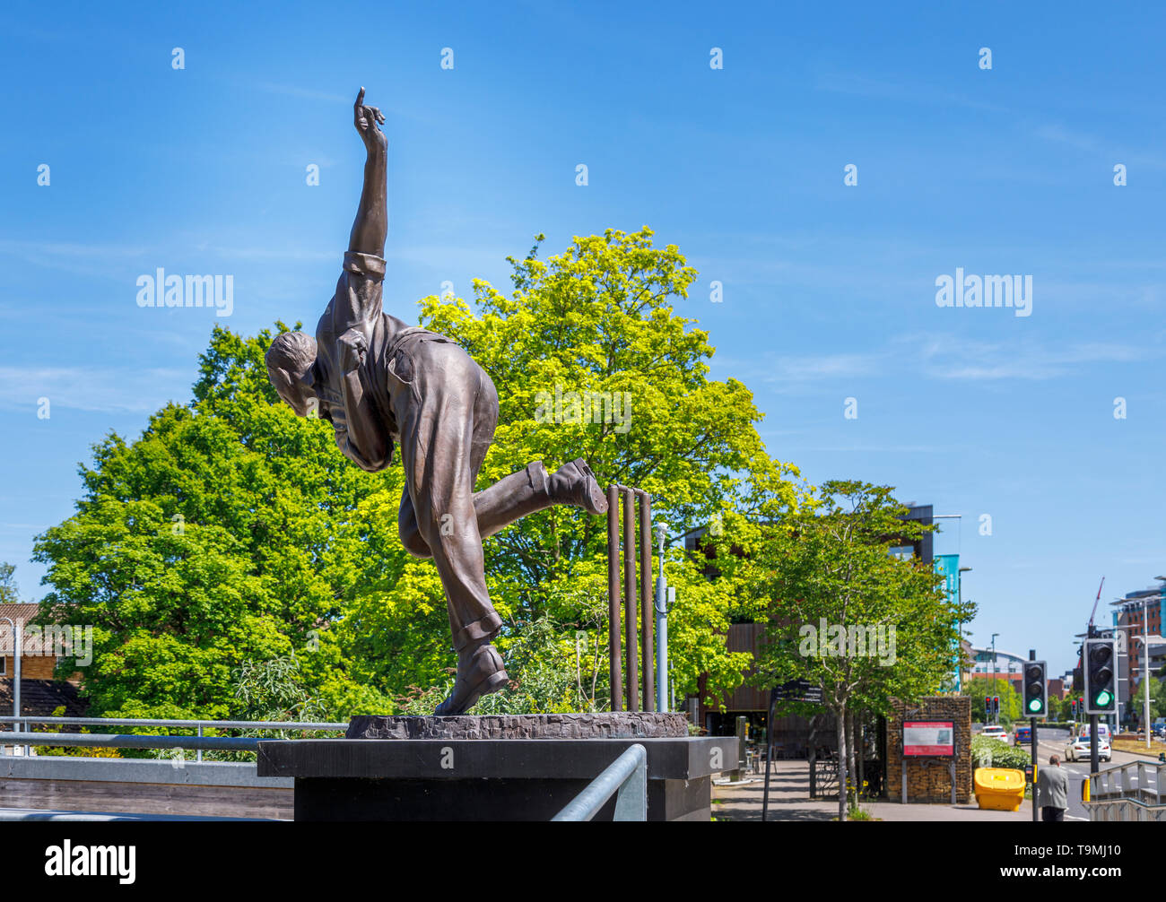 Bronze statue of cricket player Sir Alec Bedser on Bedser Bridge, a ...