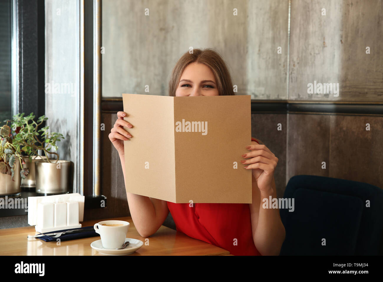 Female customer read menu hi-res stock photography and images - Alamy