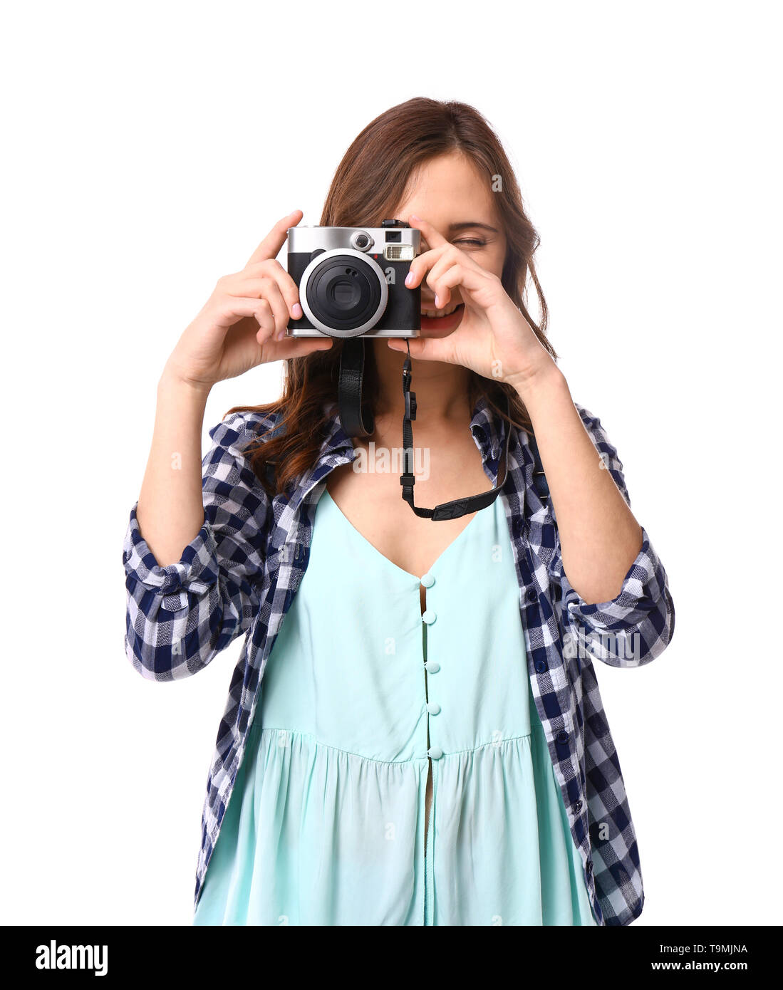 Female tourist with camera on white background Stock Photo - Alamy