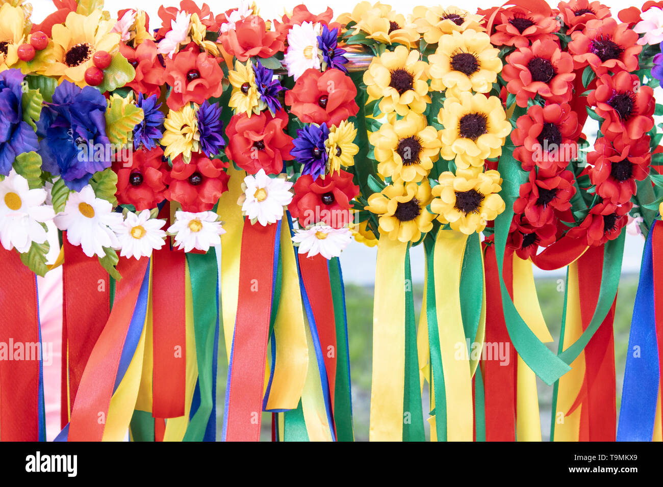 Wreath in different colors with colorful ribbons close-up Stock Photo ...