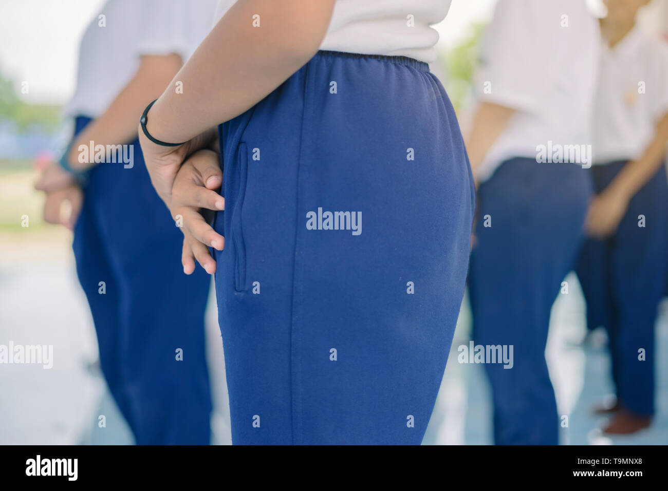 Group of students try to meditate for the peace of mind by walk with ...
