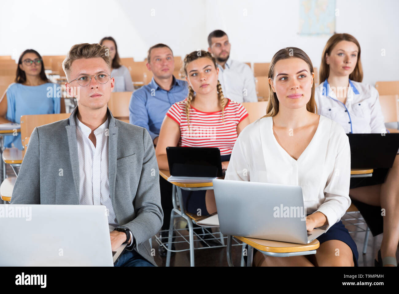 College lecture hall students laptops hi-res stock photography and ...