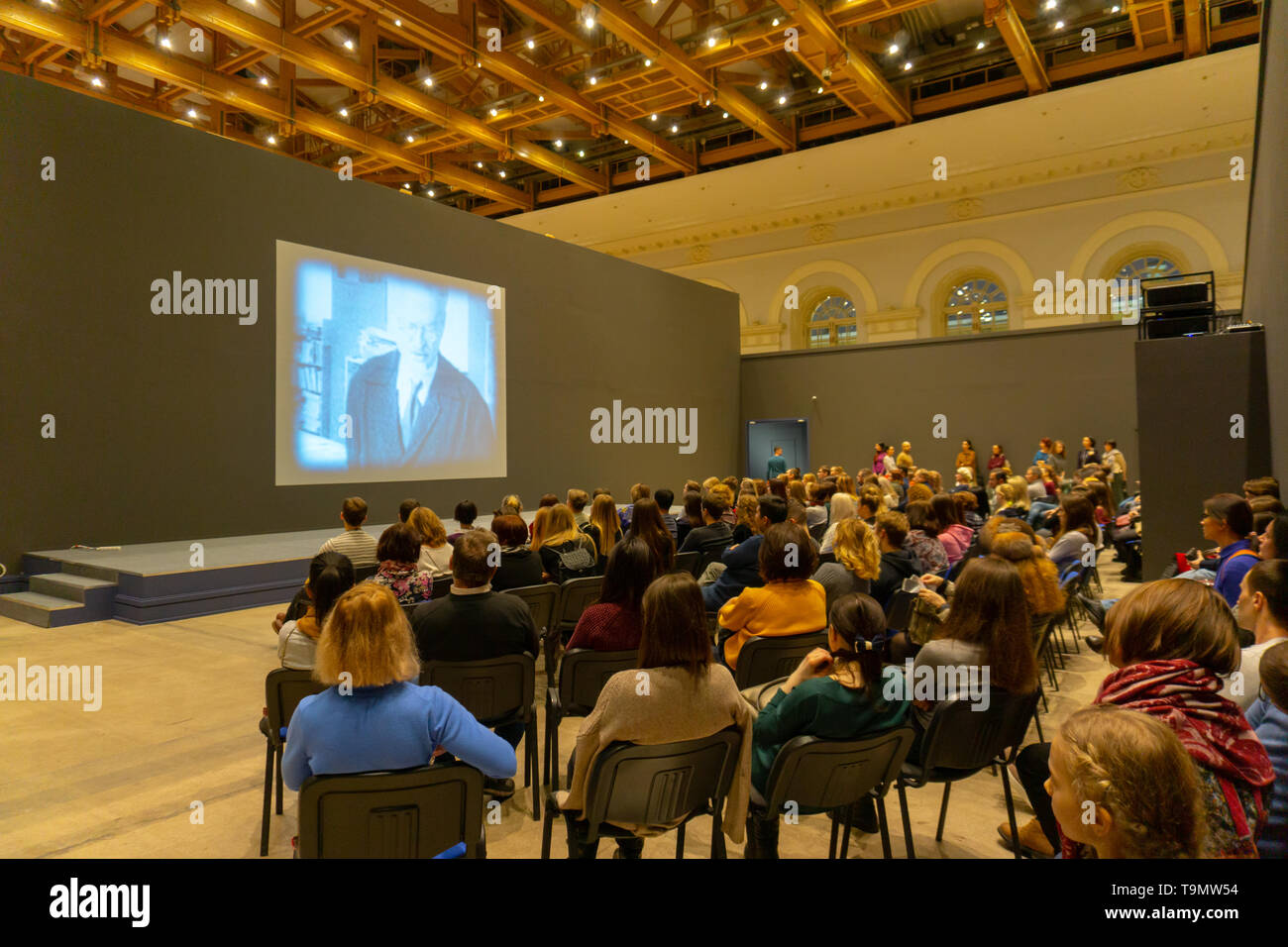 Woman watching presentation moscow public hi-res stock photography and ...