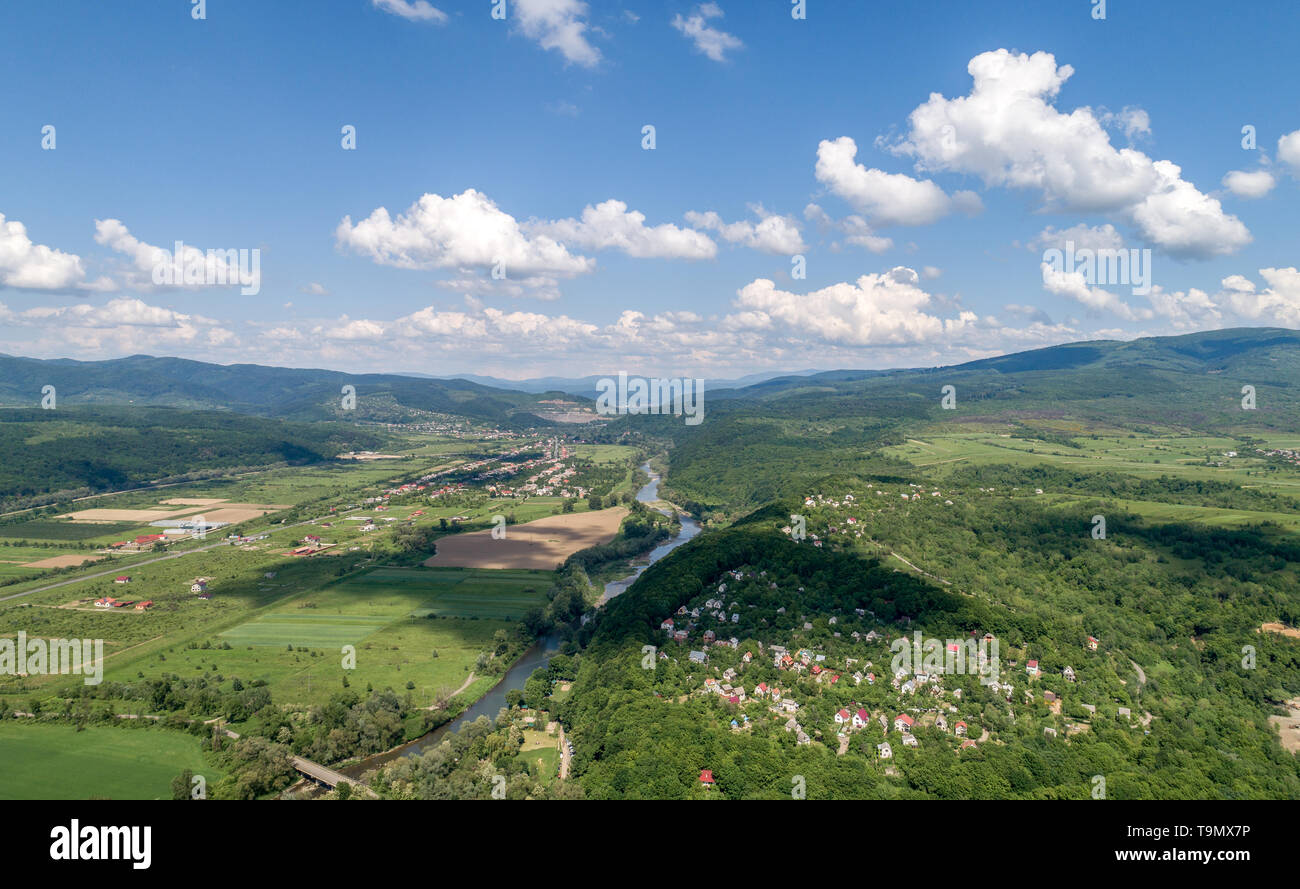 Flying above village in mountains hi-res stock photography and images ...