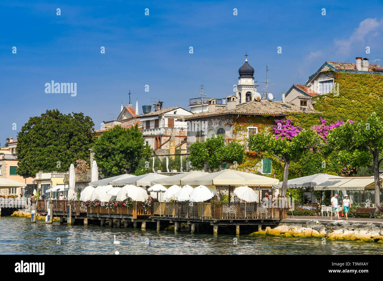 TORRI DEL BENACO, LAKE GARDA, ITALY - SEPTEMBER 2018: Outdoor dining ...
