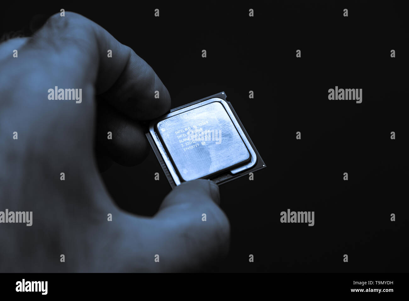 Paris, France - Apr 9. 2019: Man hand holding in dark server ...