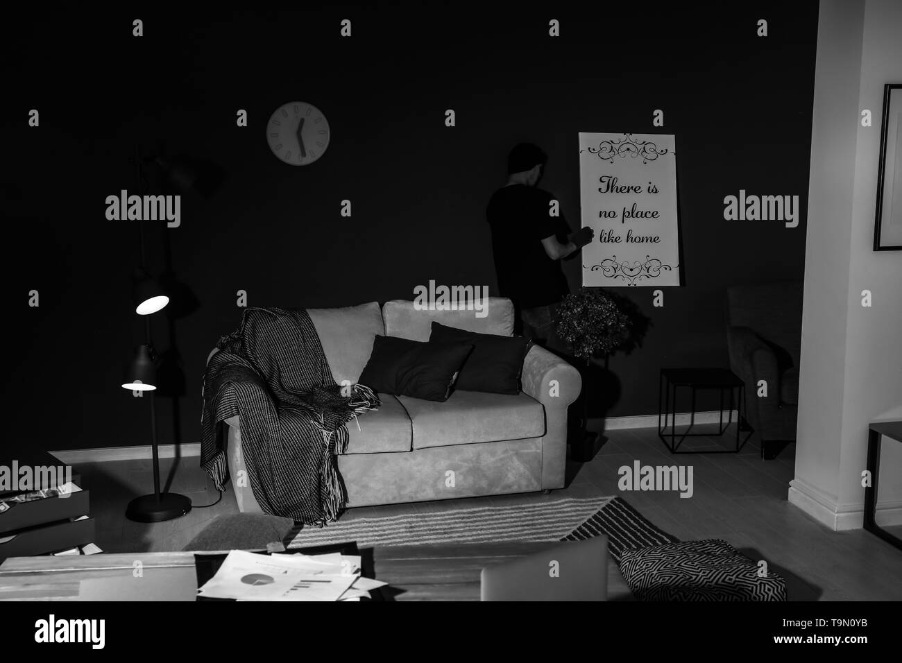 Male thief indoors, view through security camera Stock Photo - Alamy